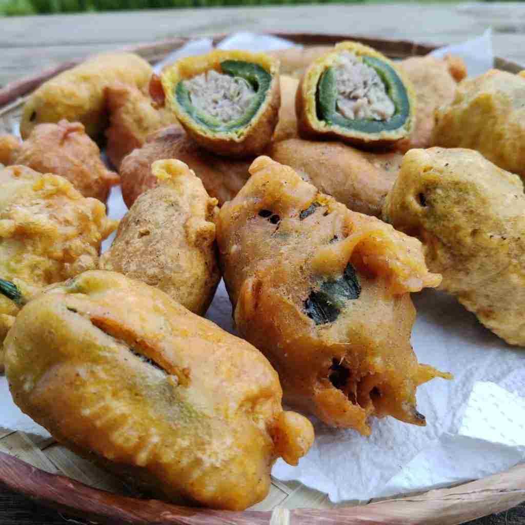 Stuffed chillies deep fried in a rich turmeric batter